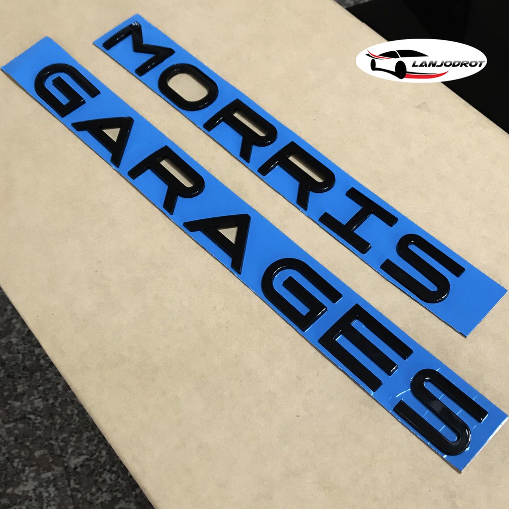 โลโก้ ตัวนูน ตัวอักษรMorris Garages สีดำเงา ตัวอักษร ขนาดสูง 3.5 cm ...
