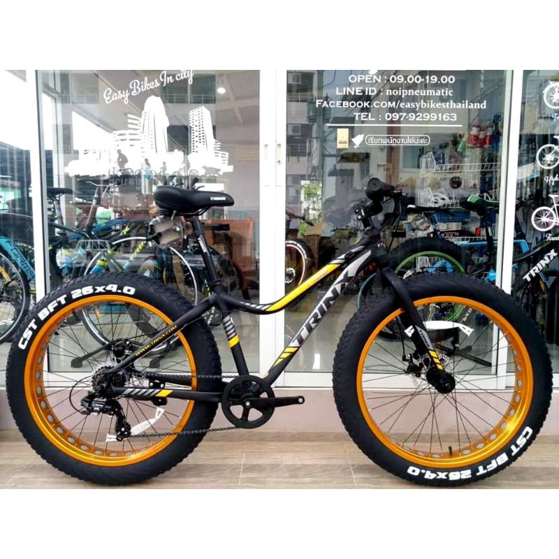 TRINX T106(ส่งฟรีทั่วไทย ผ่อน0) จักรยานล้อโต 26x4 นิ้ว เกียร์ SHIMANO 7 สปีด ดิสก์เบรค เบาะ ...
