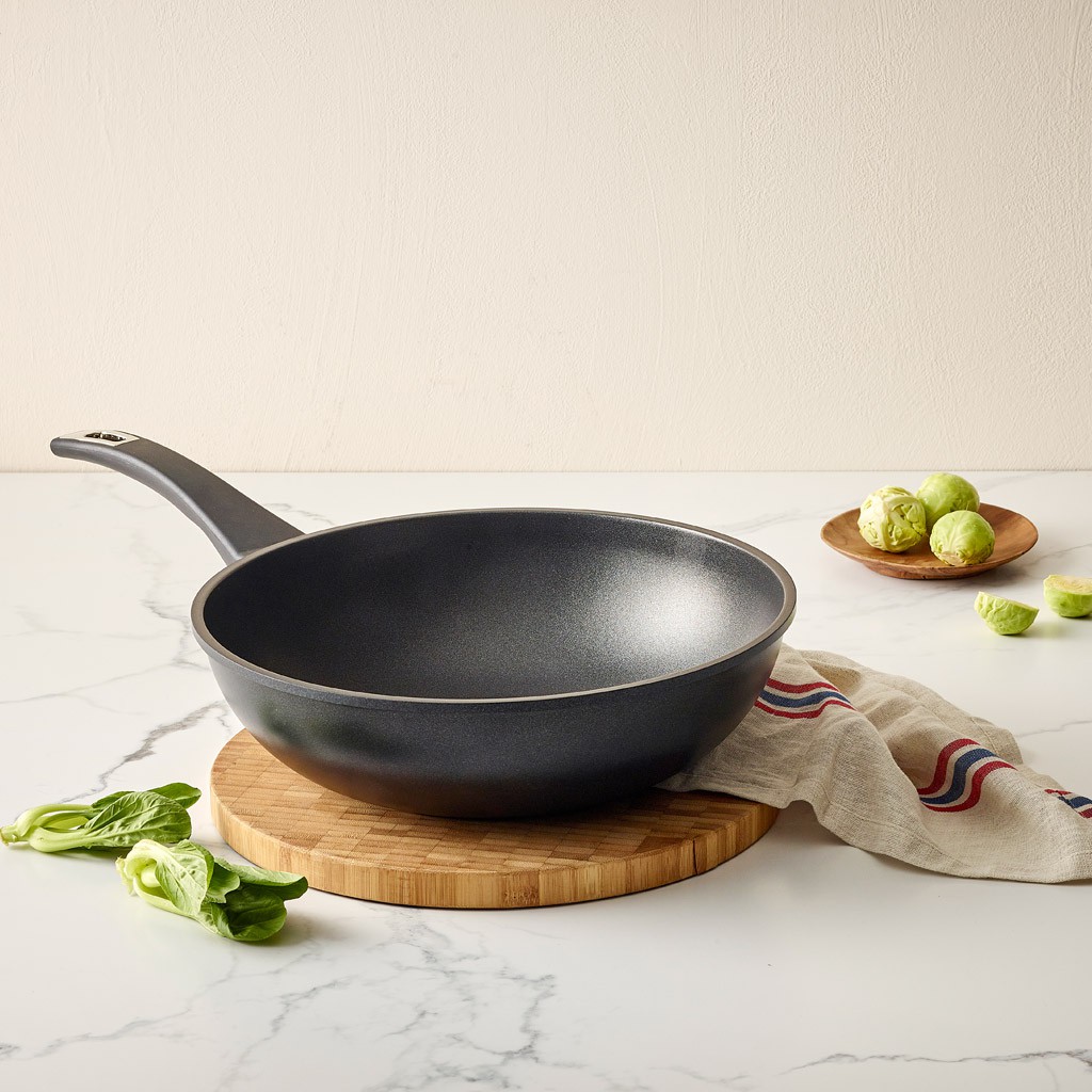 The premium non stick wok pan monster cooker which is applied ...