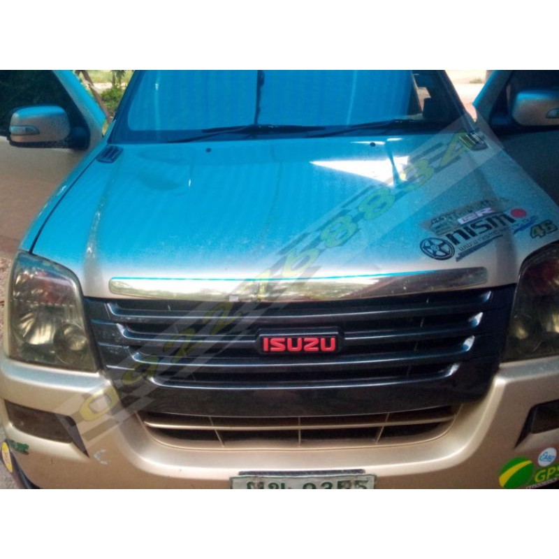 กระจังหน้า d-max 05 เคฟล่า พร้อมโลโก้แดง - a.t.racing888 - ThaiPick