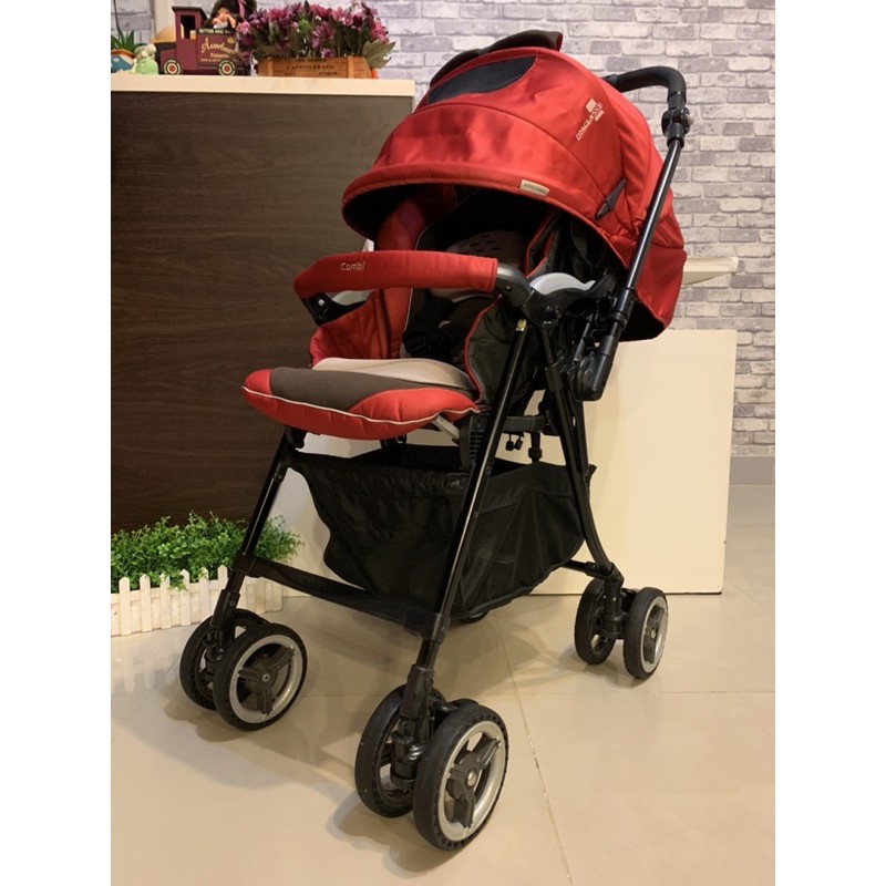 รถเข็นแบรนด์ combi รุ่น Miracle Turn Diaclasse สีแดง พร้อมซัพพอร์ต | Shopee Thailand