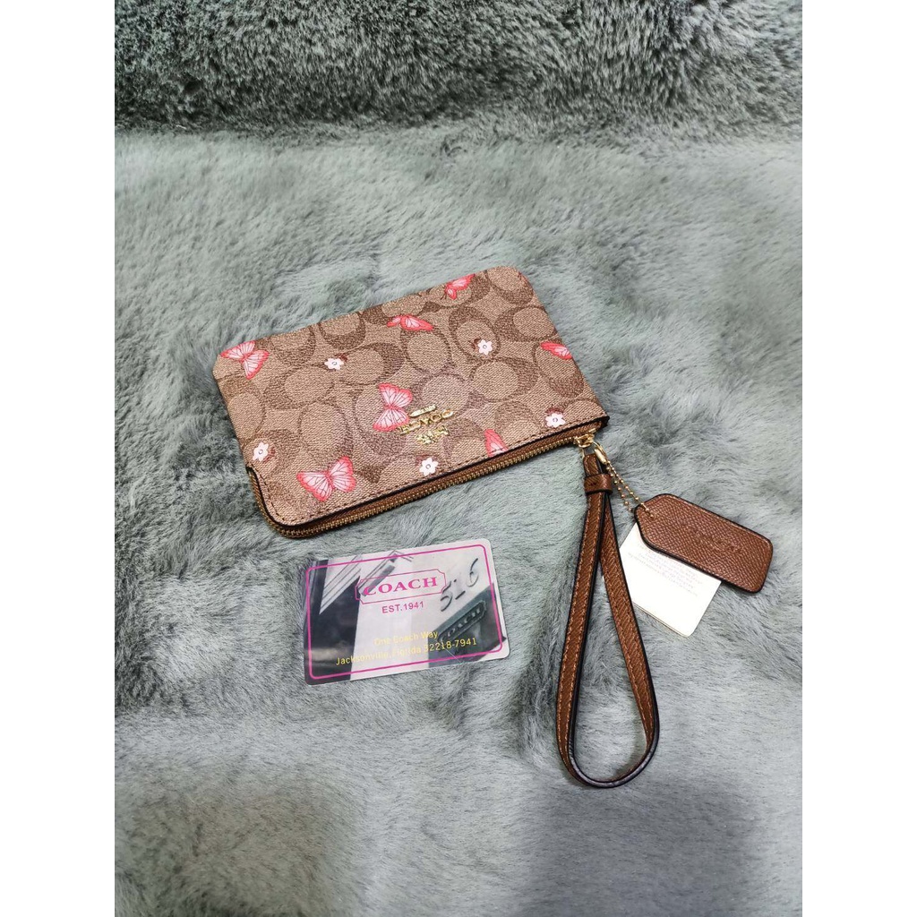 กระเป๋าคล้องมือผู้หญิง Coach ขนาด 6.5 นิ้ว เป็นหนัง นิ่ม เบา มีหลายสี ...