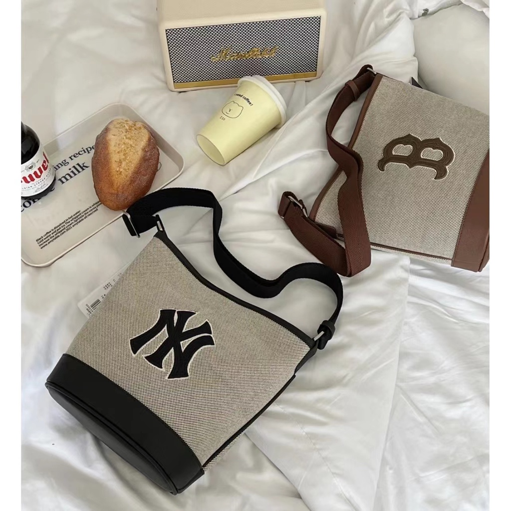 จัดส่งที่รวดเร็ว 2022 new mlb bucket bag NY canvas handbag shoulder ...