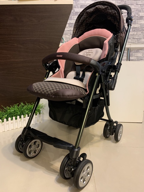 รถเข็นแบรนด์ combi รุ่น Miracle Turn Diaclasse Auto4 เบาะหนังสีน้ำตาลชมพู ลายหลุยส์ พร้อม ...