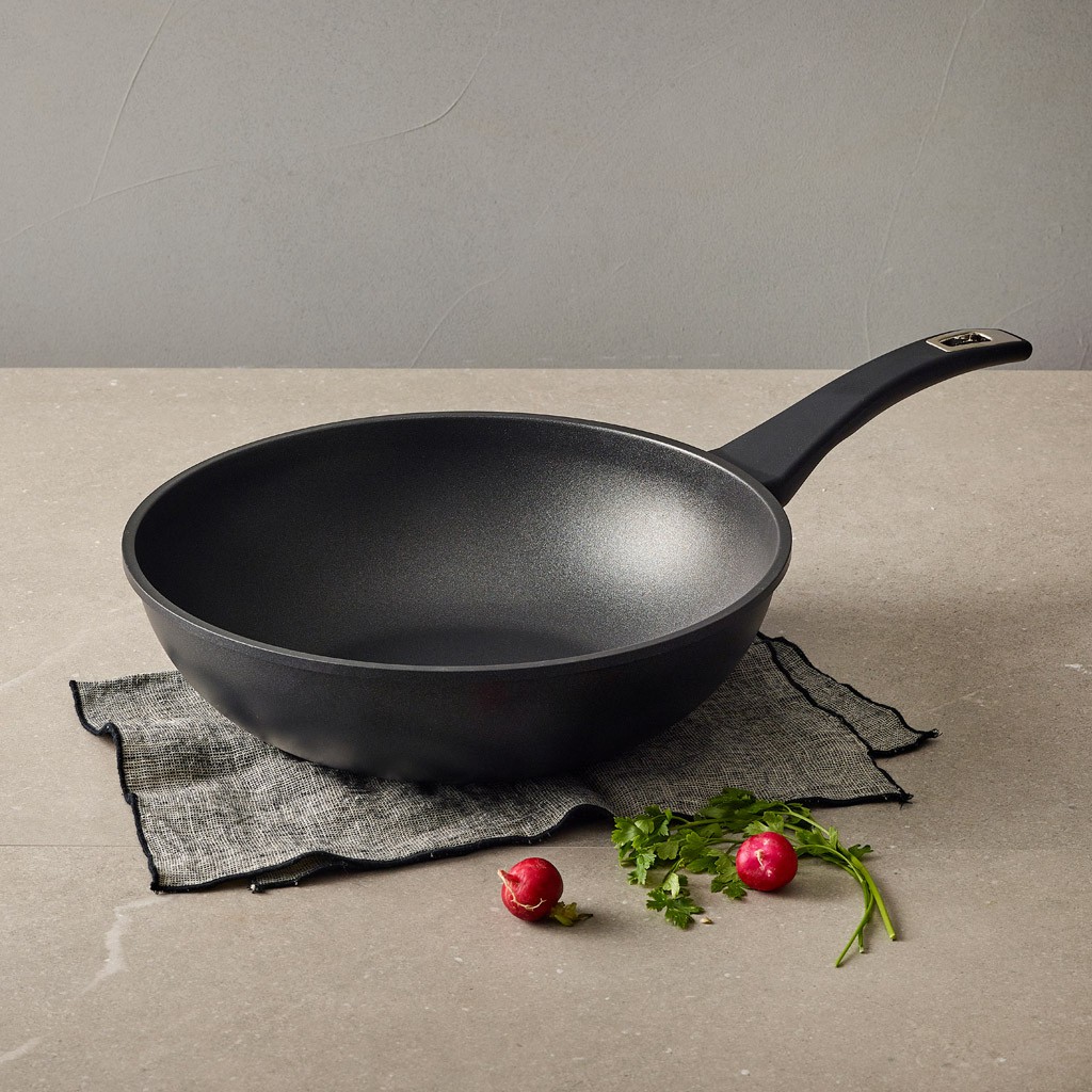The premium non stick wok pan monster cooker which is applied ...