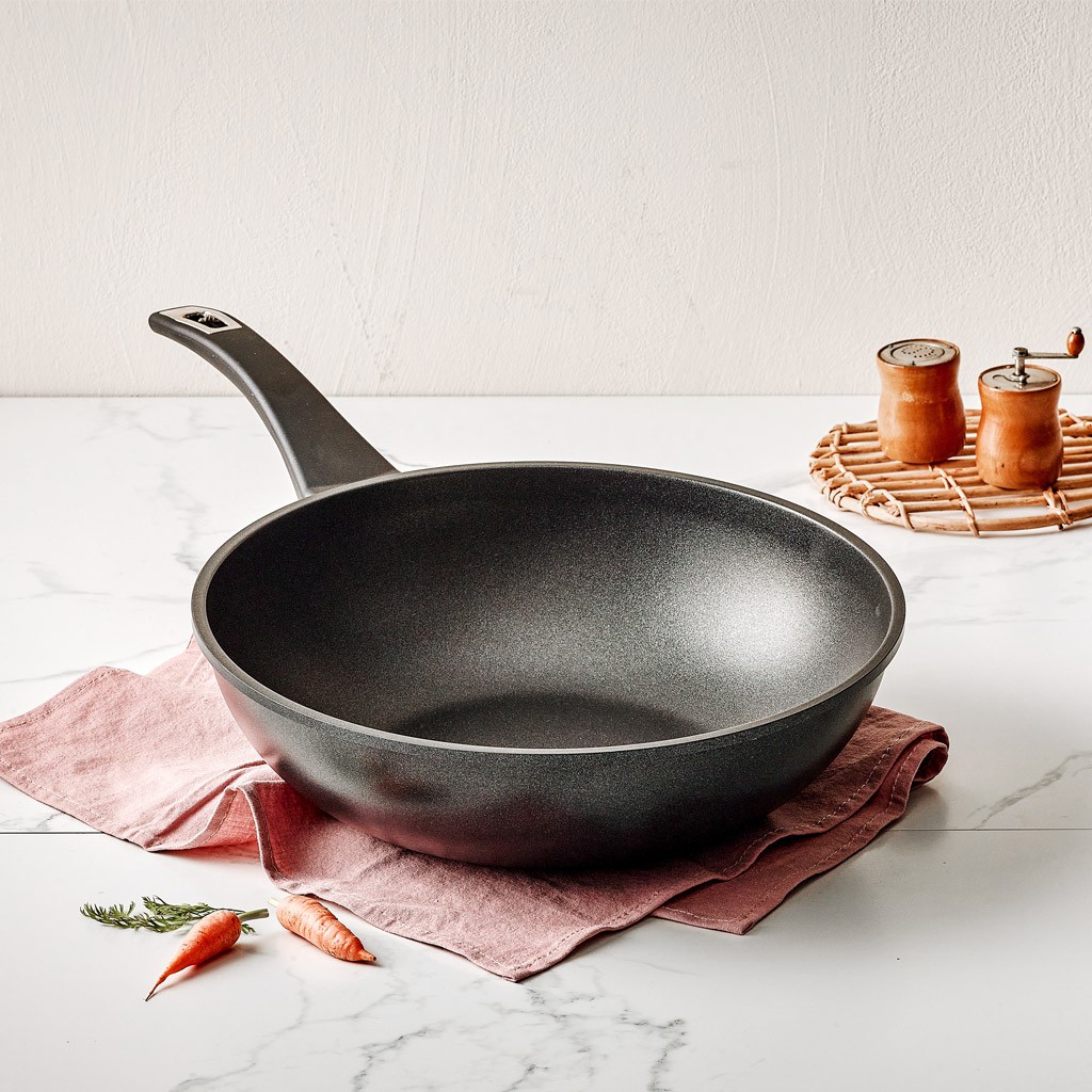 The premium non stick wok pan monster cooker which is applied ...