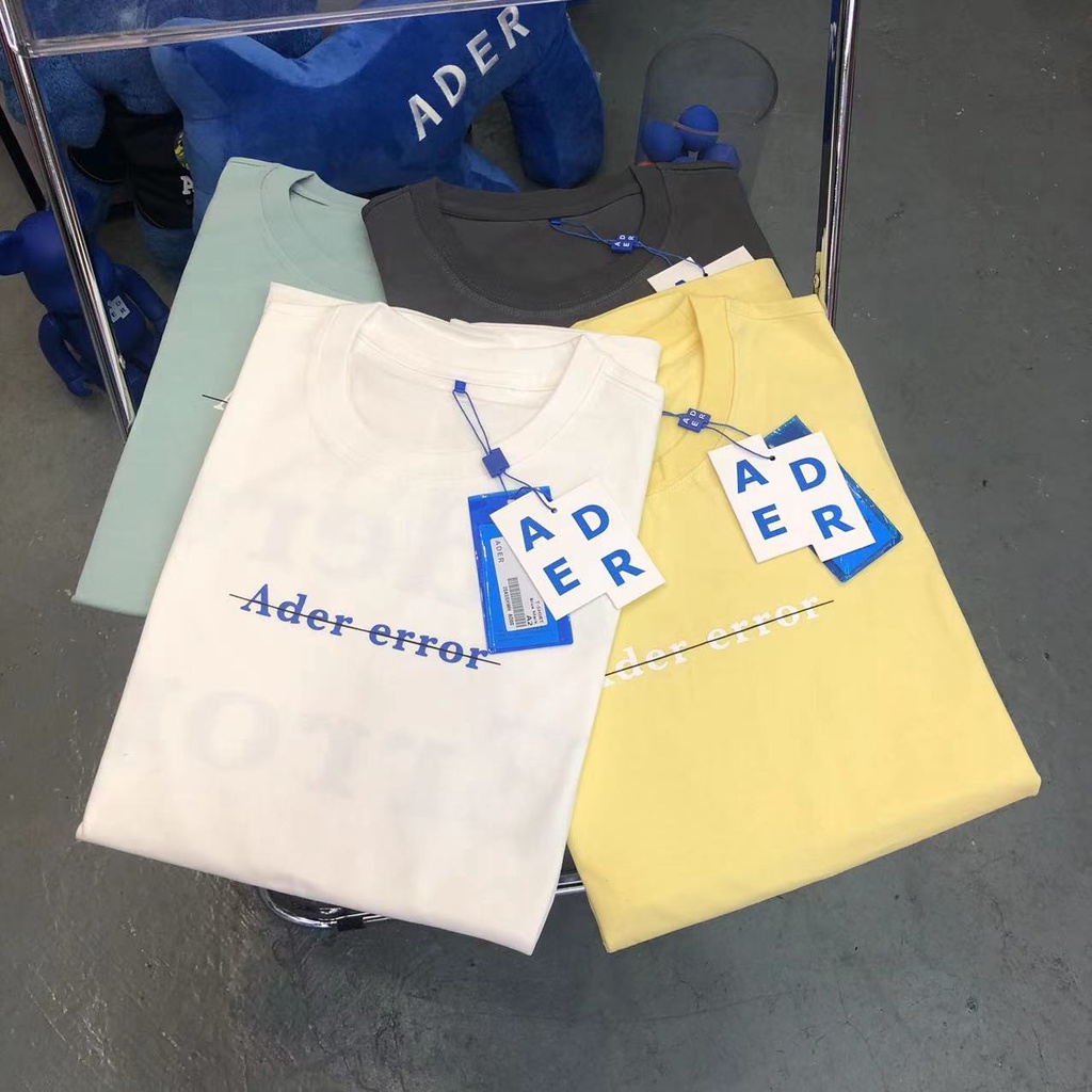 เสื้อยืดคอกลม แขนสั้น ผ้าฝ้ายแท้ พิมพ์ลายตัวอักษร ADER ERROR สีแคนดี้ ...