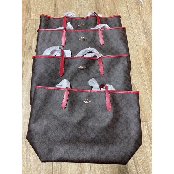 พร้อมส่งในไทยแท้จากอเมกา CITY TOTE IN SIGNATURE CANVAS (โทสนิ่ม ...